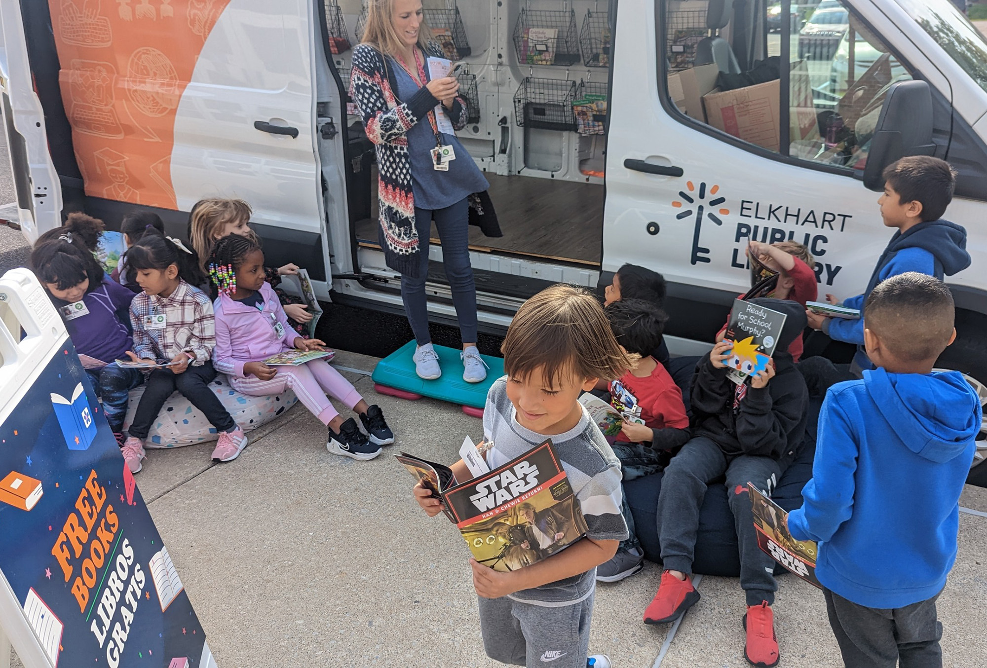 Book Bus makes connections all over the county, putting books in homes ...