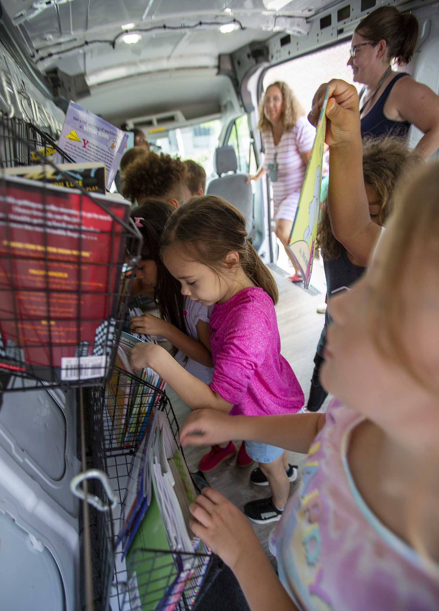 Book Bus makes connections all over the county, putting books in homes ...